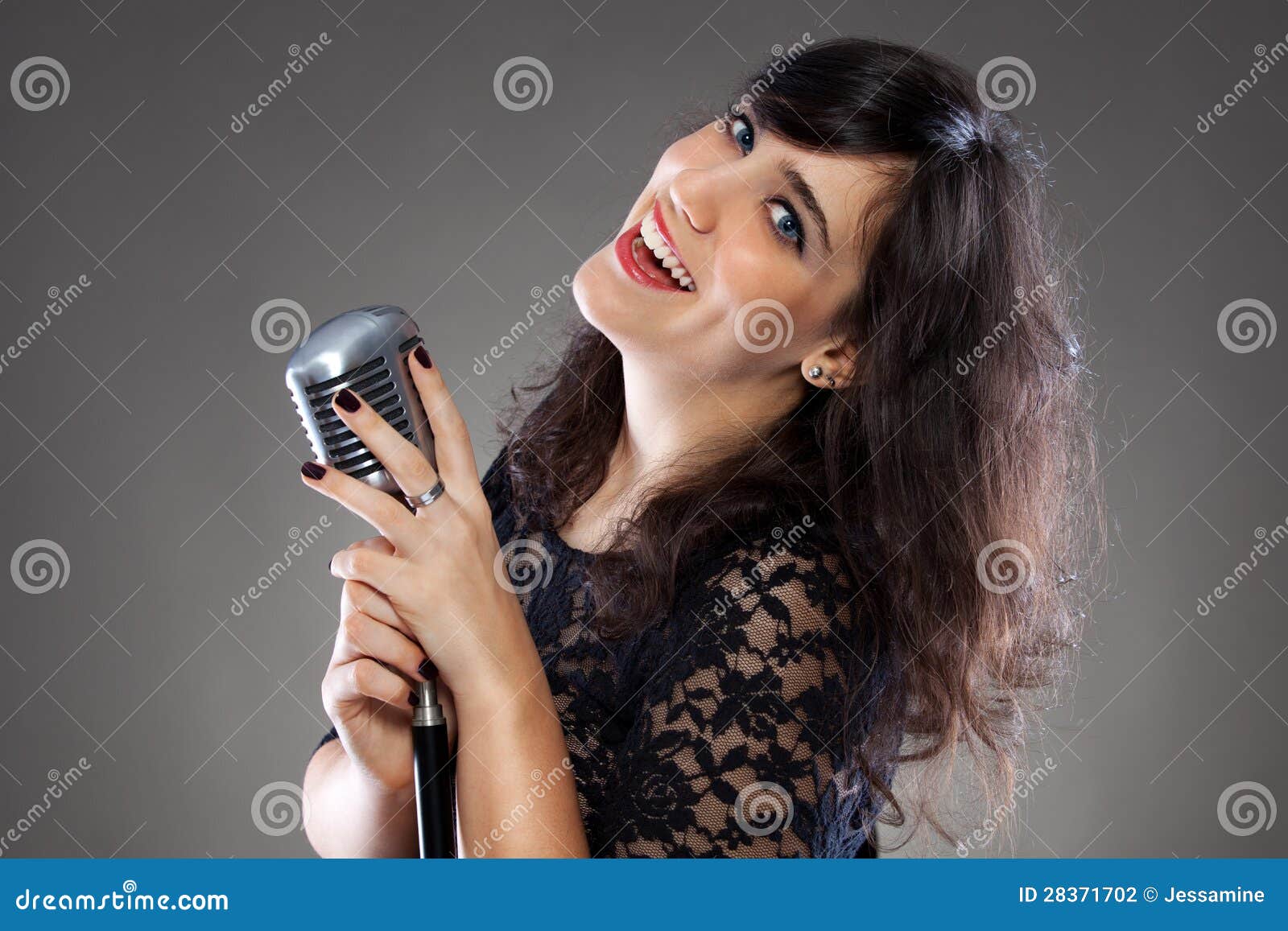Attractive Young Woman with a Retro Microphone Stock Photo - Image of ...