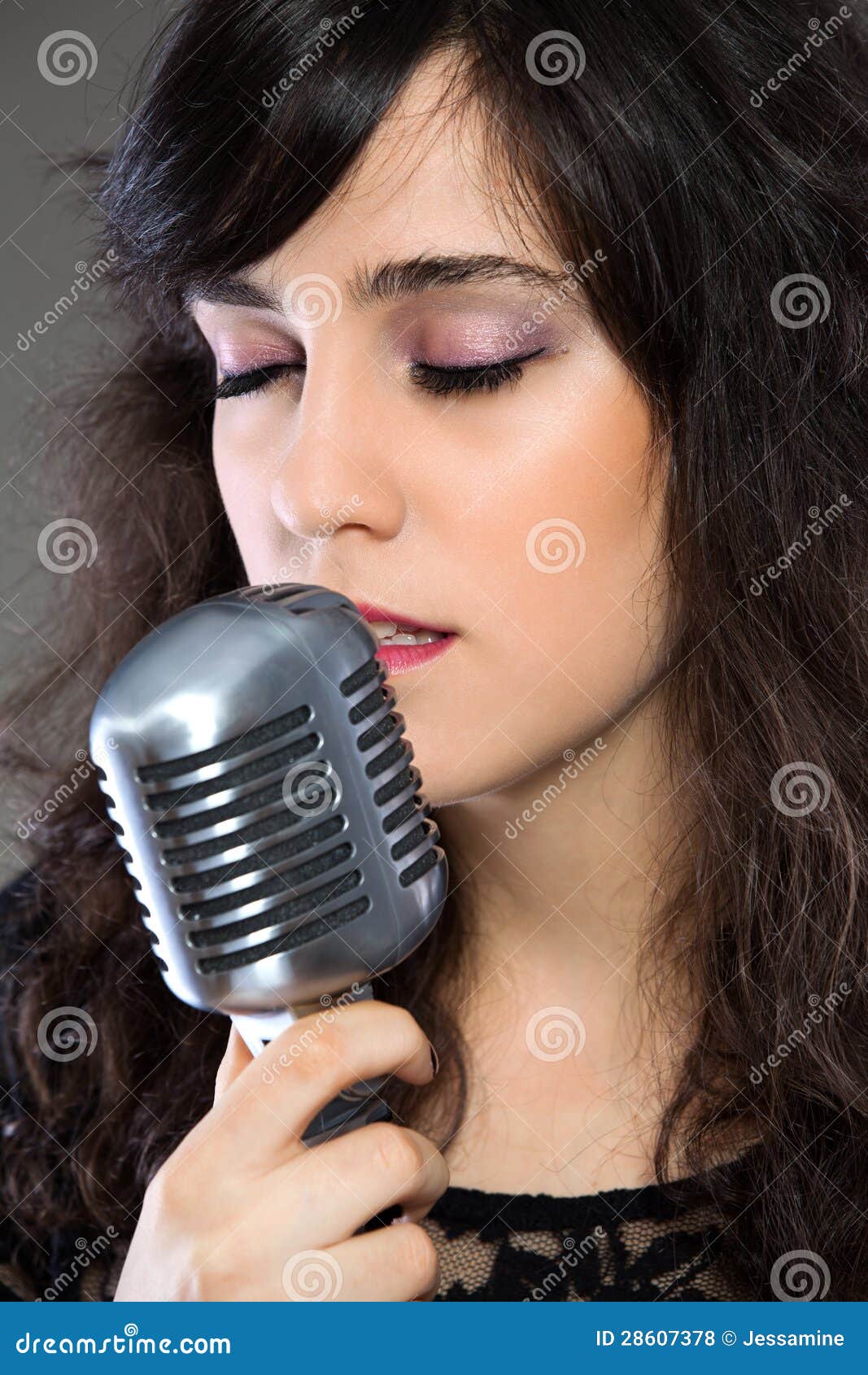 Attractive Young Woman with a Retro Microphone Stock Photo - Image of ...