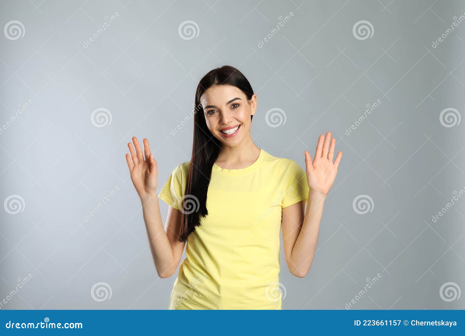 Attractive Young Woman Showing Hello Gesture on Grey Background Stock ...