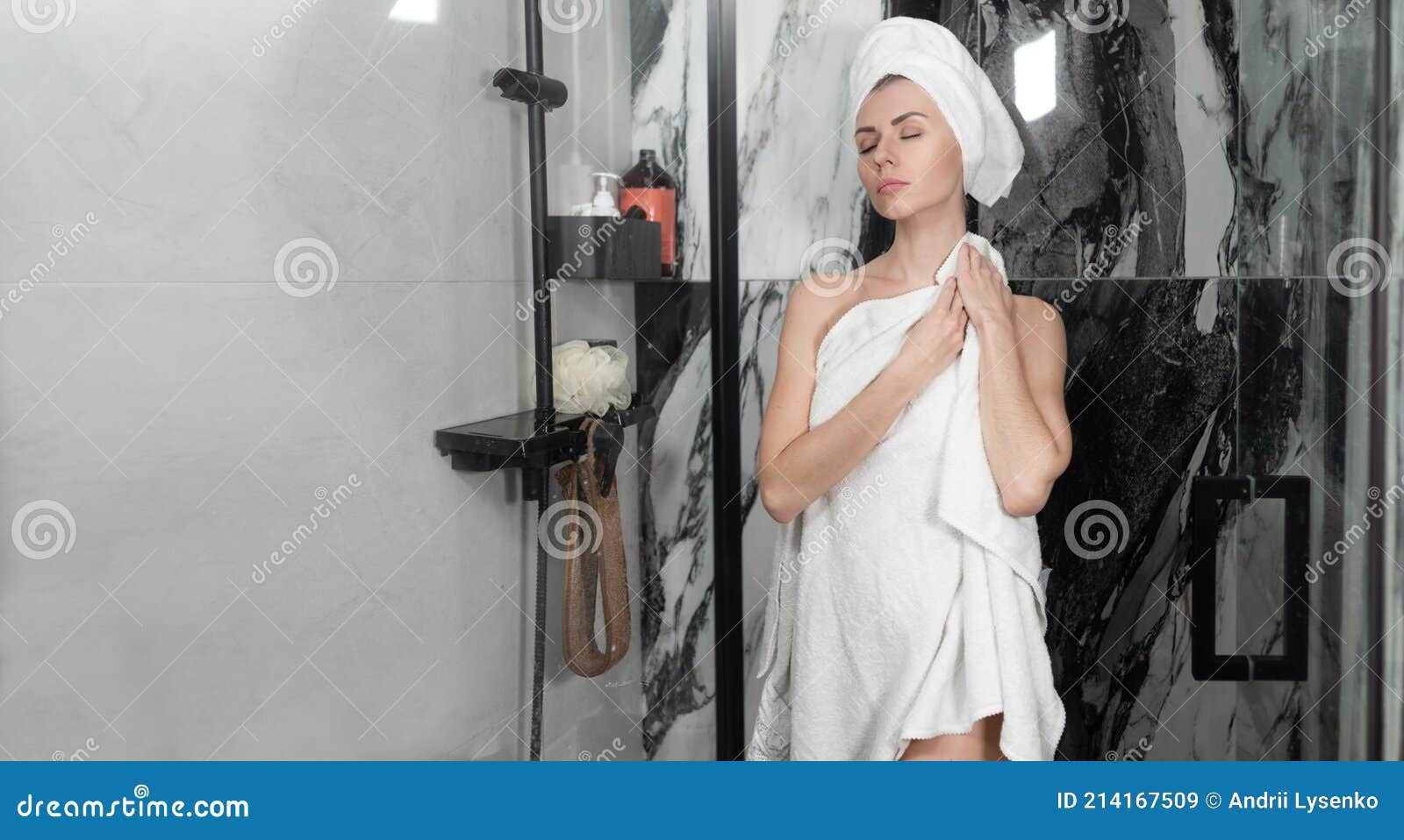 Attractive Young Woman Standing In A Bathtub With A Towel Blonde Wipes