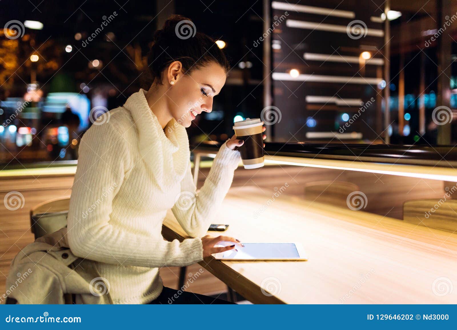Attractive Young Woman Using Tablet in Cafe Stock Photo - Image of ... Attractive Young Woman Using Tablet in Cafe Stock Photo - Image of ...