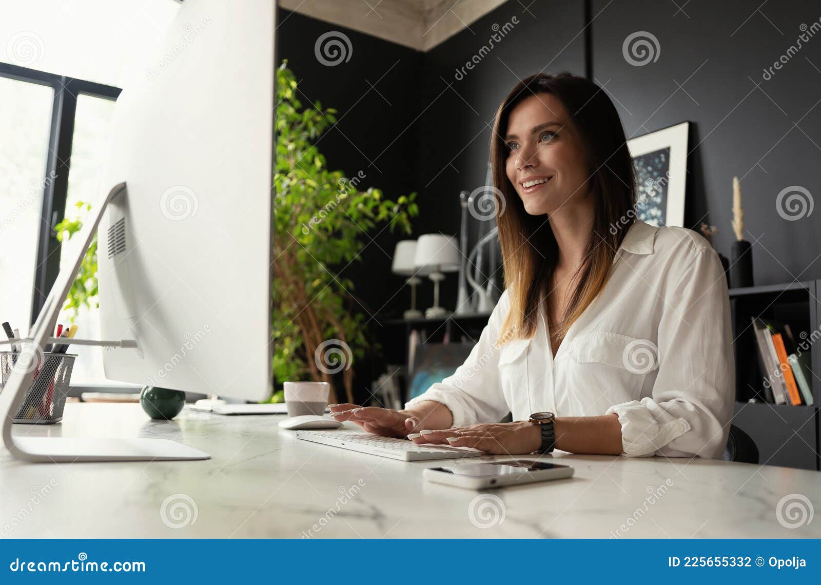 Attractive Young Woman Working at Office, Using Contemporary Desktop ...