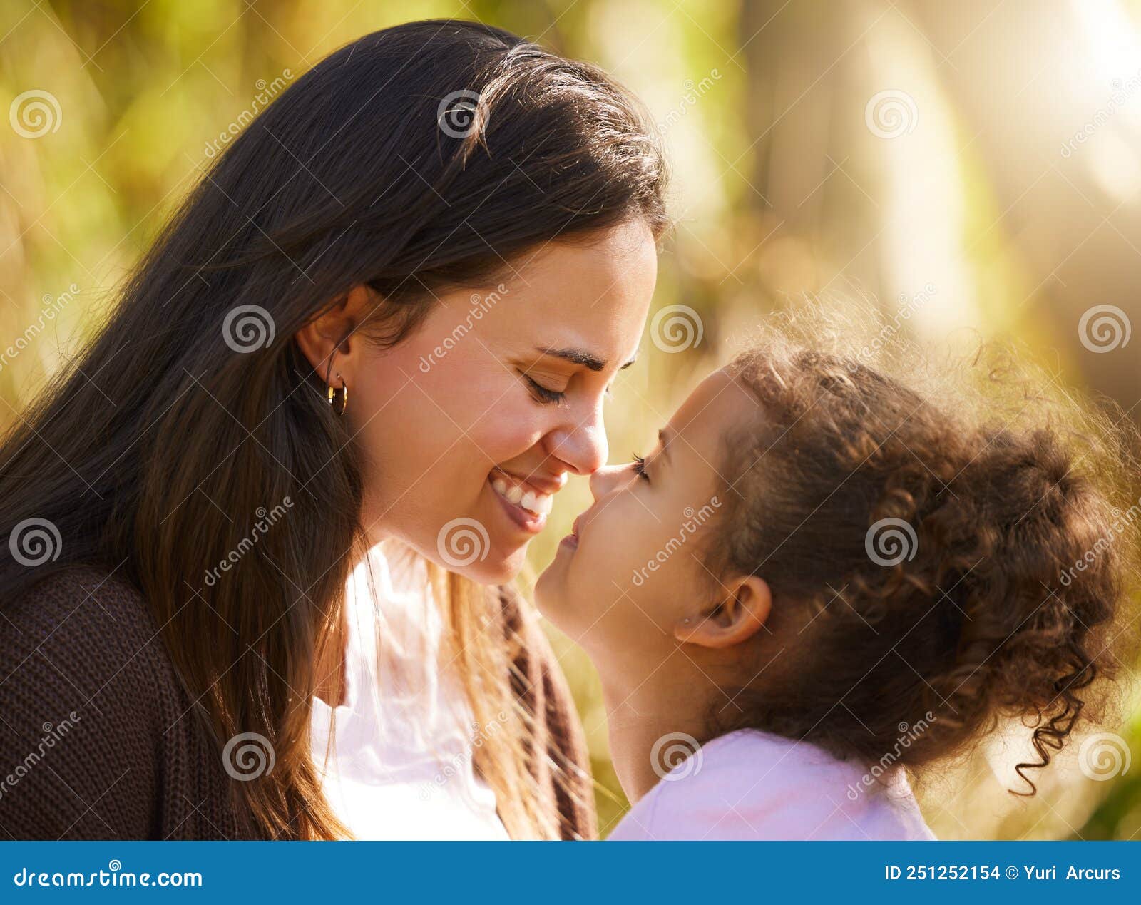 A Mothers Love An Attractive Young Woman And Her Daughter Sharing An