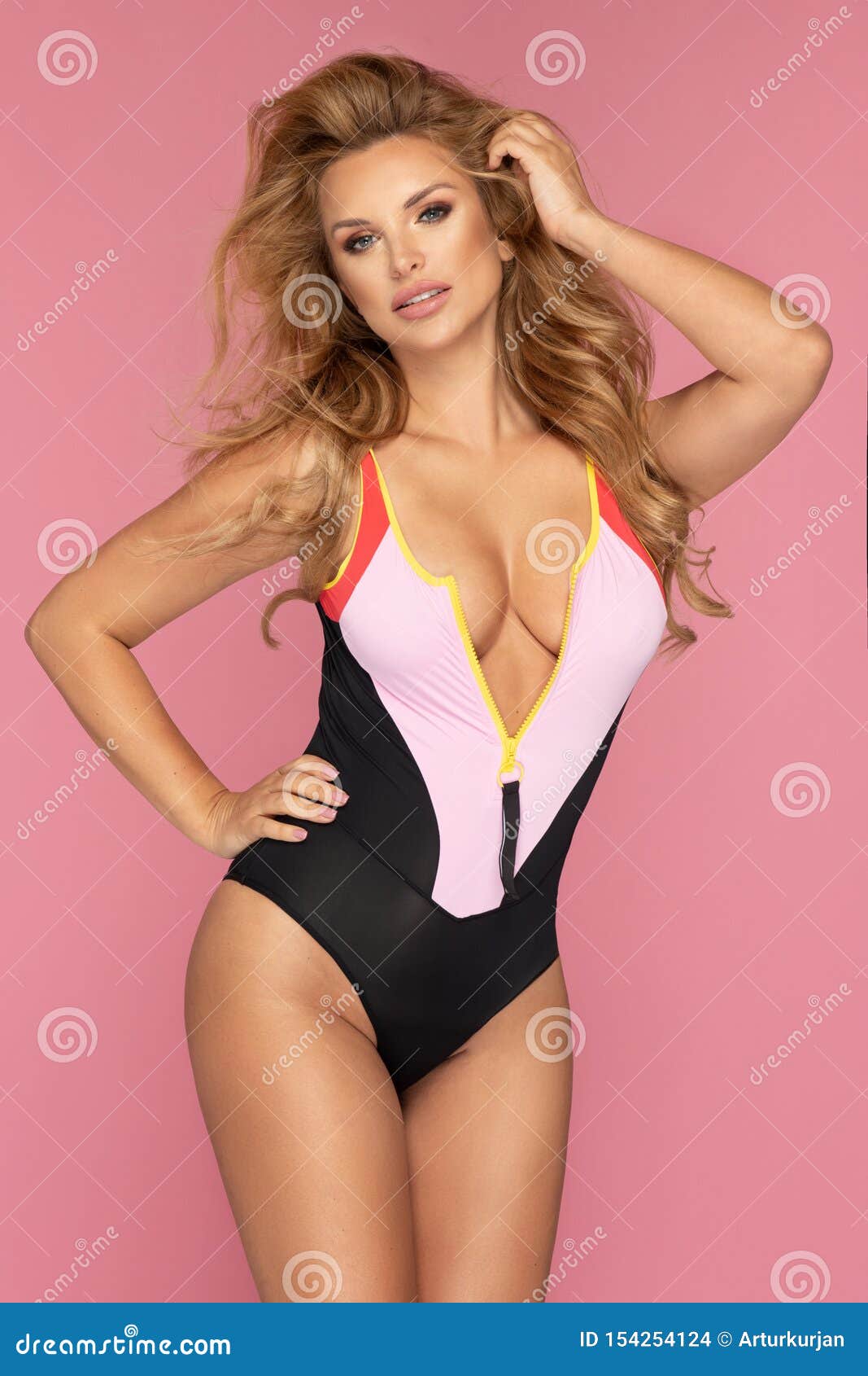 Attractive Long Haired Beautiful Woman With Perfect Body Posing In