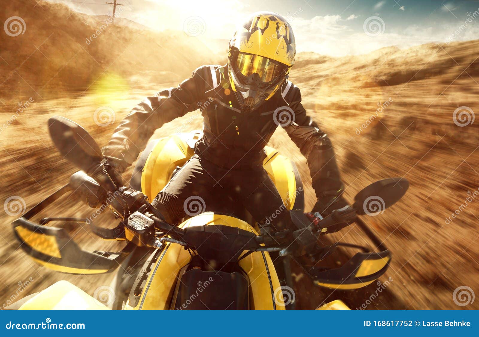 ATV Driver on full speed stock photo. Image of quad - 168617752