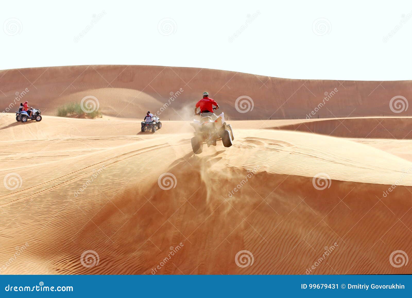 ATV jump on a sand dune editorial photo. Image of jump - 99679431