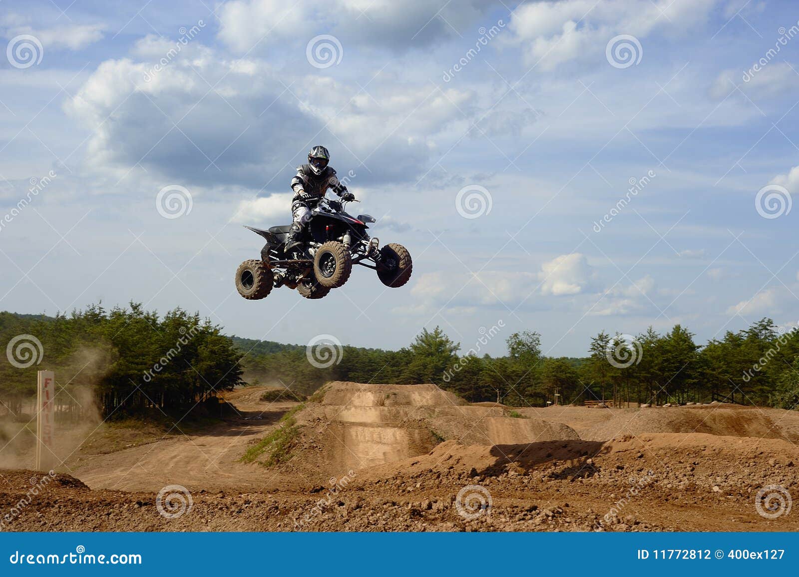 Atv rider 2 Jumping stock photo. Image of jump, jumping - 11772812