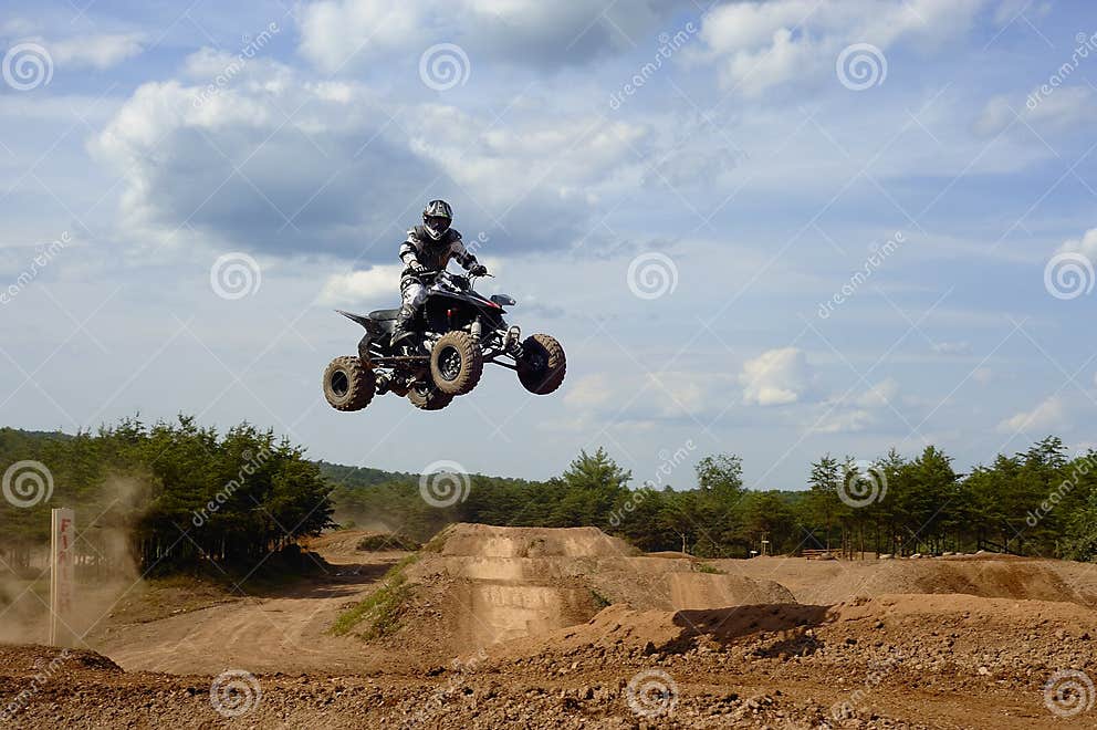 Atv rider 2 Jumping stock photo. Image of jump, jumping - 11772812
