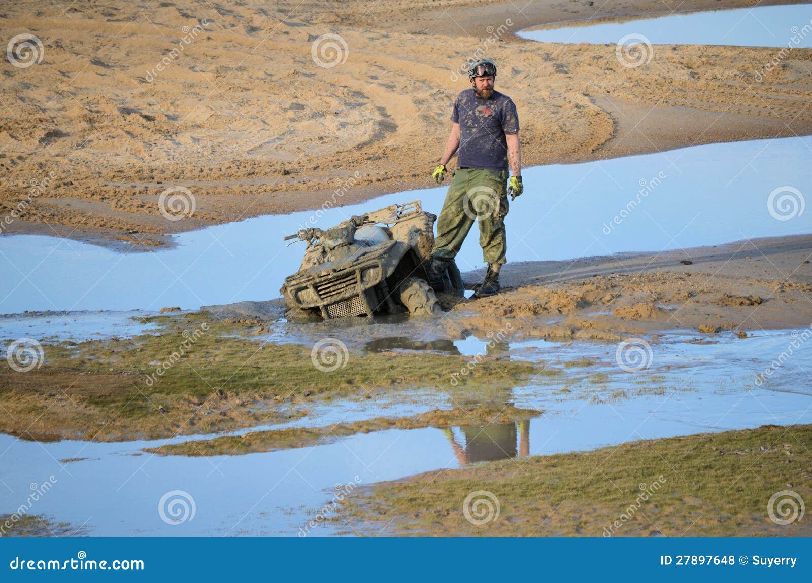 ATV Stuck Mud Pit Pond Man editorial stock photo. Image of terrain ...