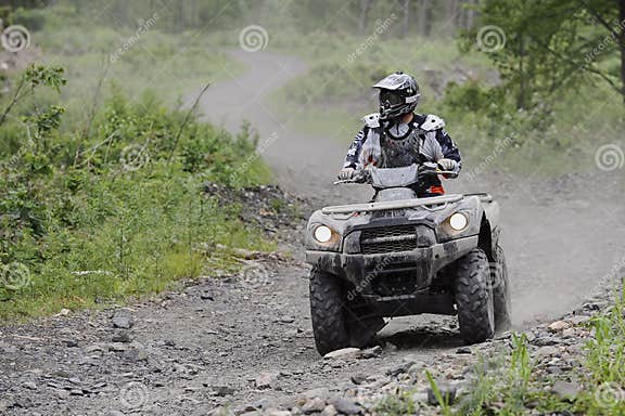 ATV Trail Rider stock photo. Image of rocks, getaway - 20111508