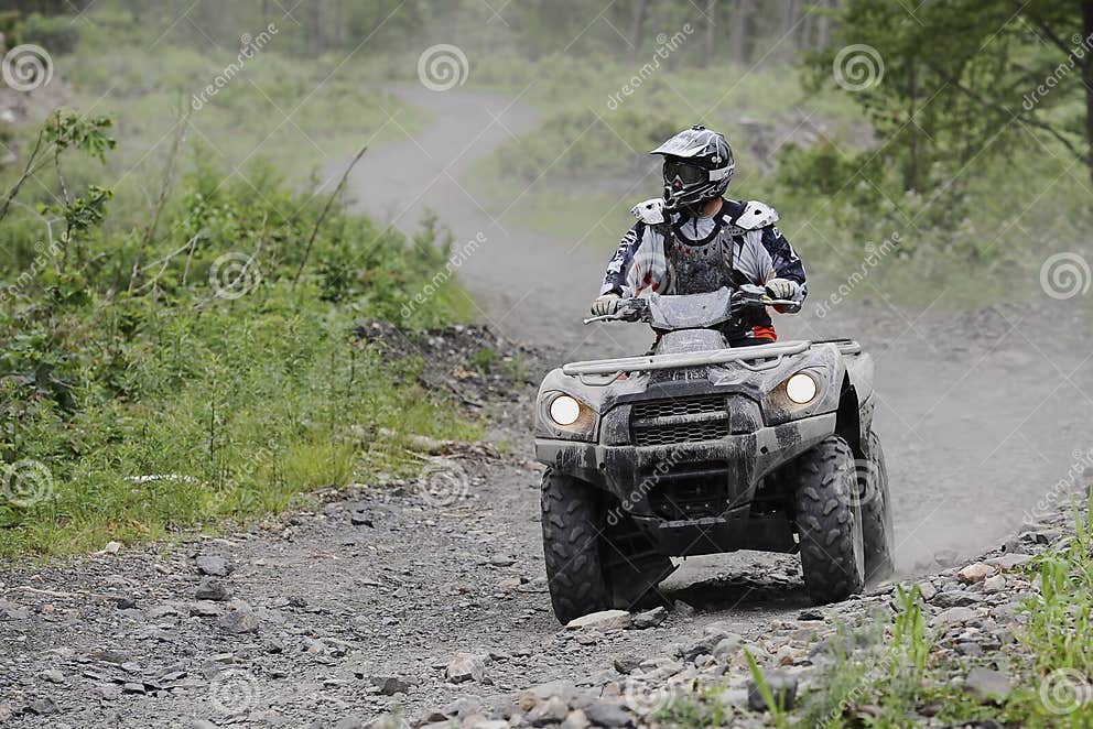 ATV Trail Rider stock photo. Image of rocks, getaway - 20111508