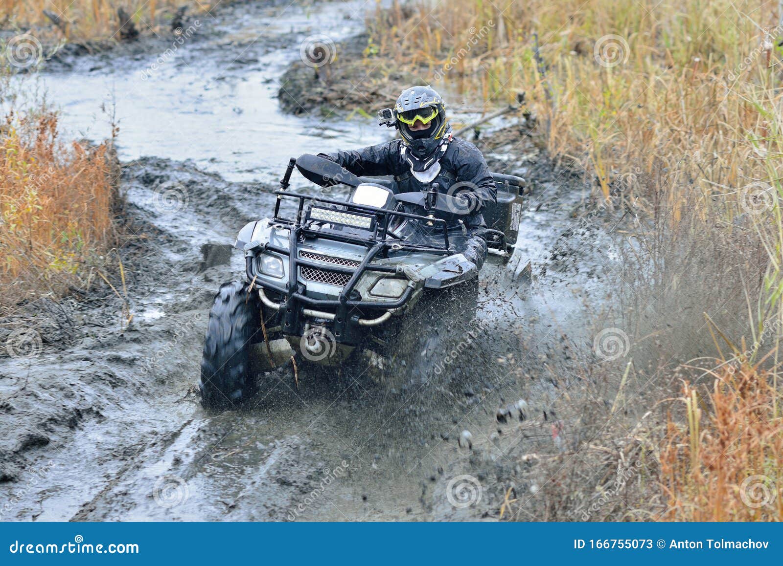 ATV and UTV Driving in Mud and Water Stock Image - Image of autumn ...
