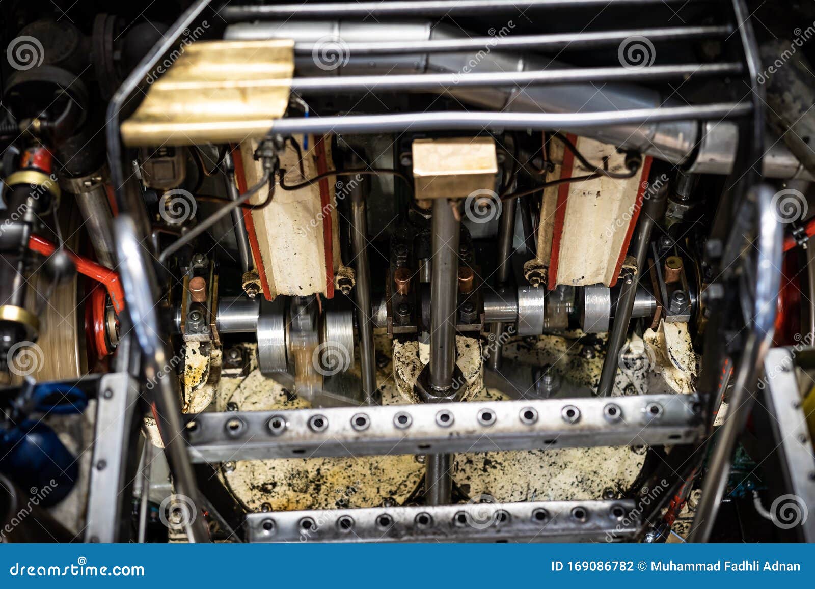 A Worker Insert A Coal Inside The Engine Of Coaled Power Steam Ship ...