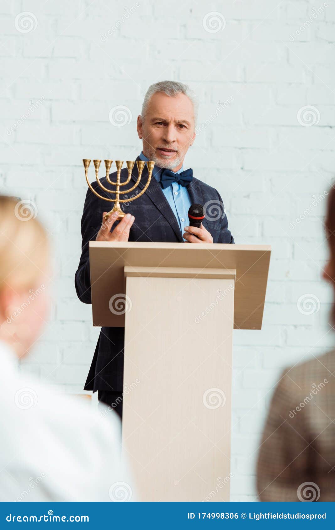 Auctioneer Talking with Microphone and Holding Stock Photo - Image of ...