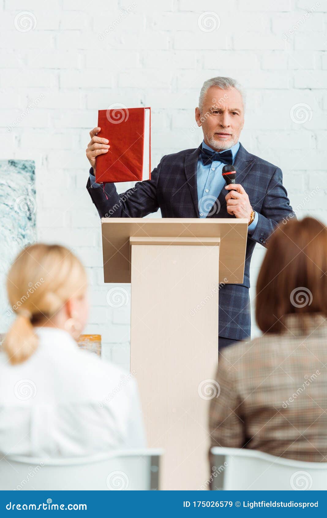Auctioneer Talking with Microphone and Holding Stock Image - Image of ...