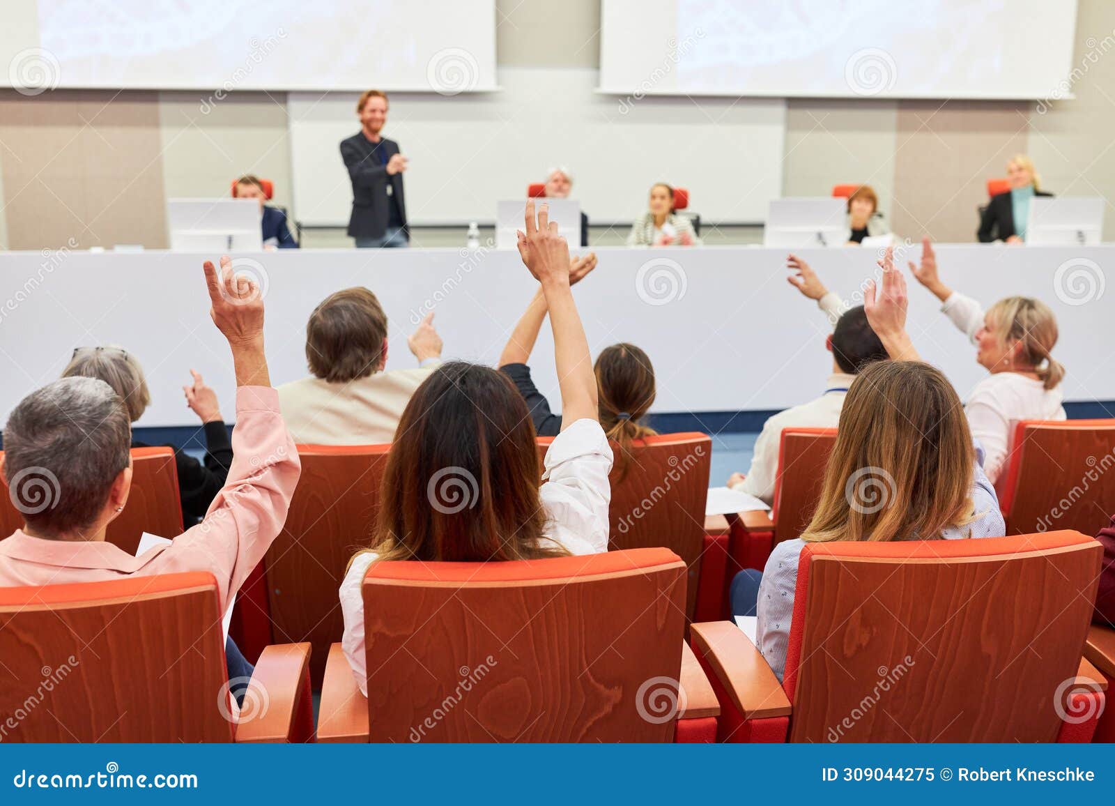 Audience Asking Question To Speaker at Business Conference Event Stock ... Audience Asking Question To Speaker at Business Conference Event Stock ...