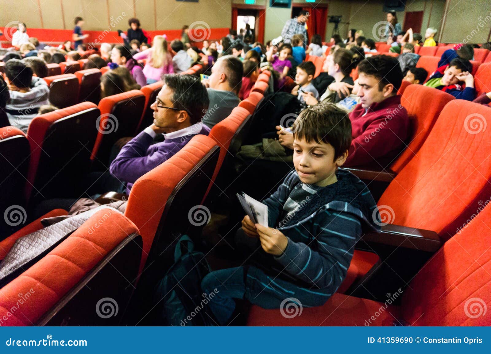 Audience in cinema editorial image. Image of theater - 41359690