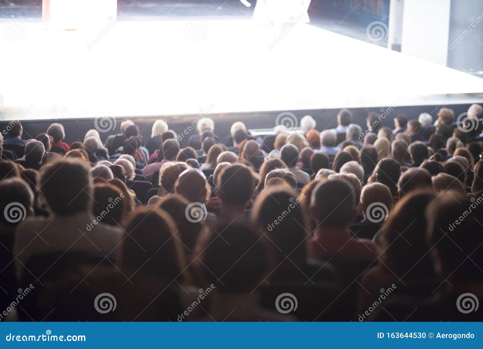 Audience at the theater editorial image. Image of back - 163644530