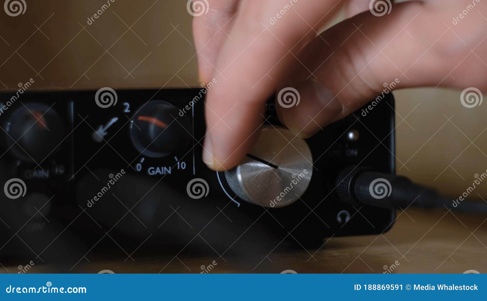 Audio Amplifier. Concept. Configuring Sound Parameters Using Rotating ...