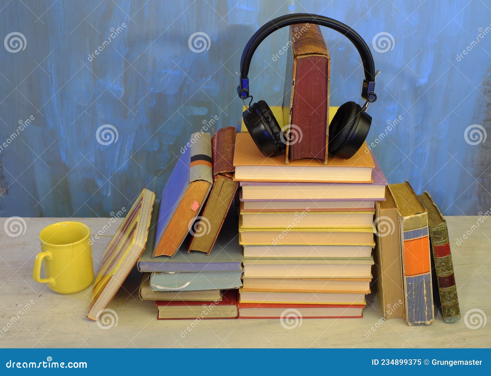 Audio Book Concept, with Stack of Books, Headphones and Cup of Coffee ...
