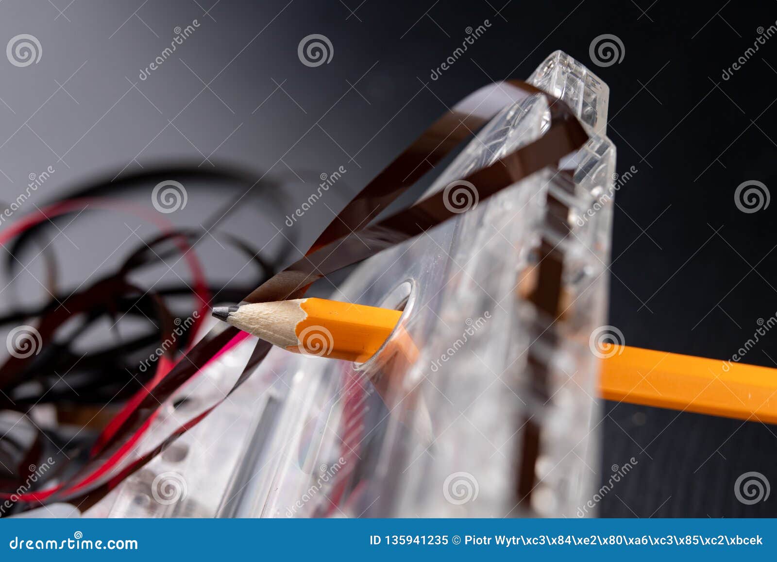 Audio Cassette And Pencil On A Black Table Old Magnetic Data Carrier Stock Image Image Of