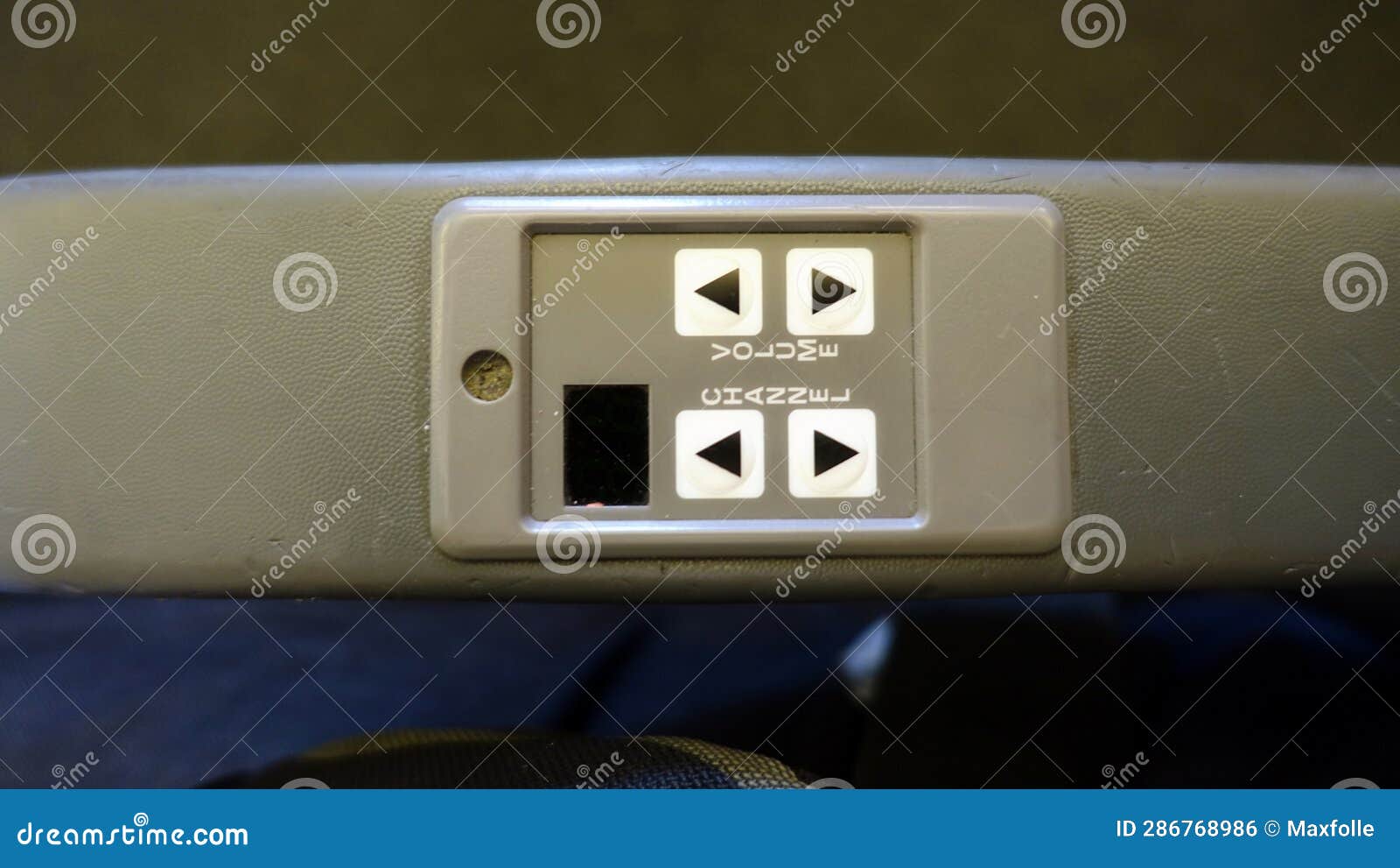 Audio Control on an Armrest of an Airplane Chair. Stock Photo - Image ...