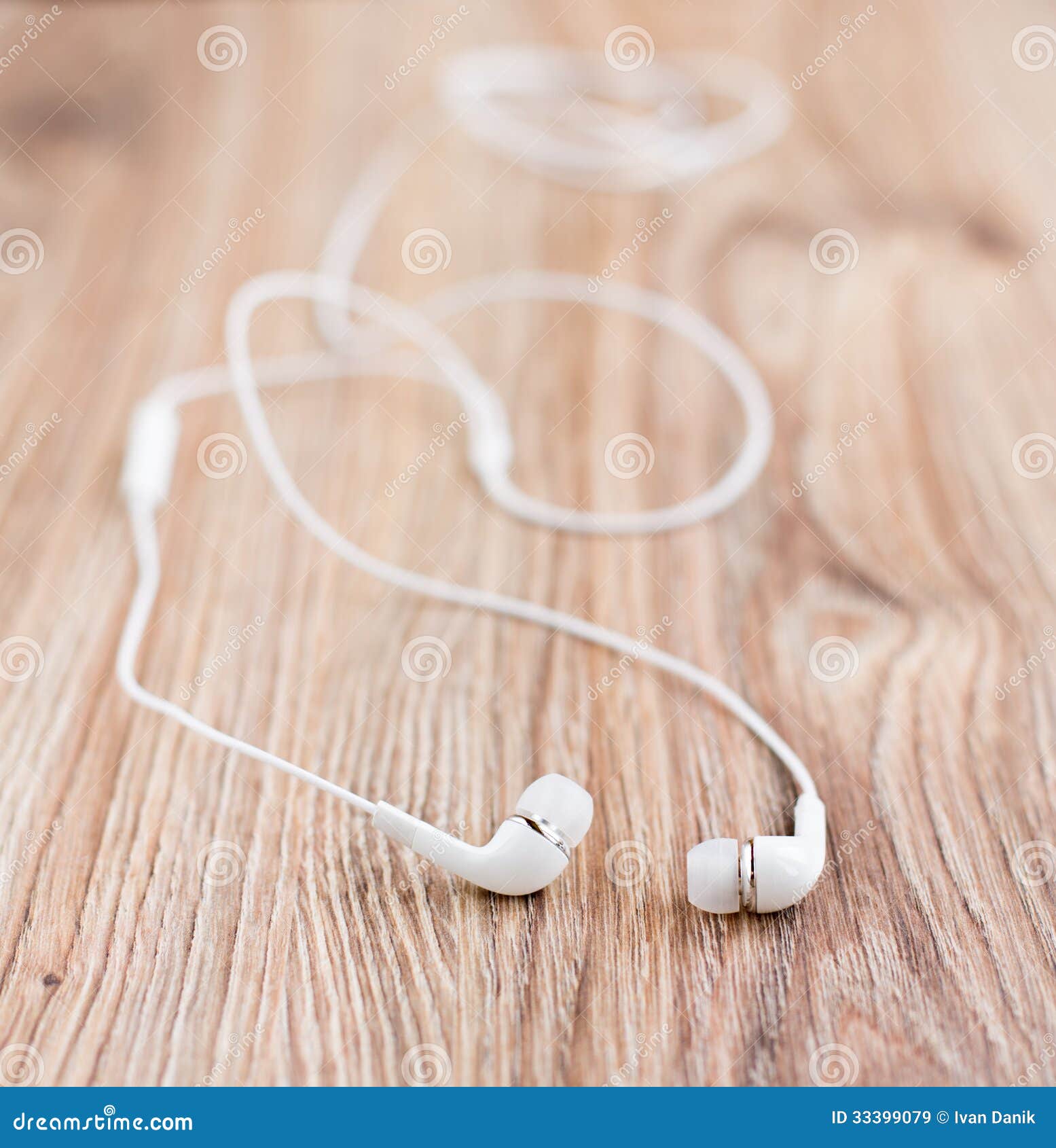 Audio earphones on a table stock image. Image of accessory - 33399079