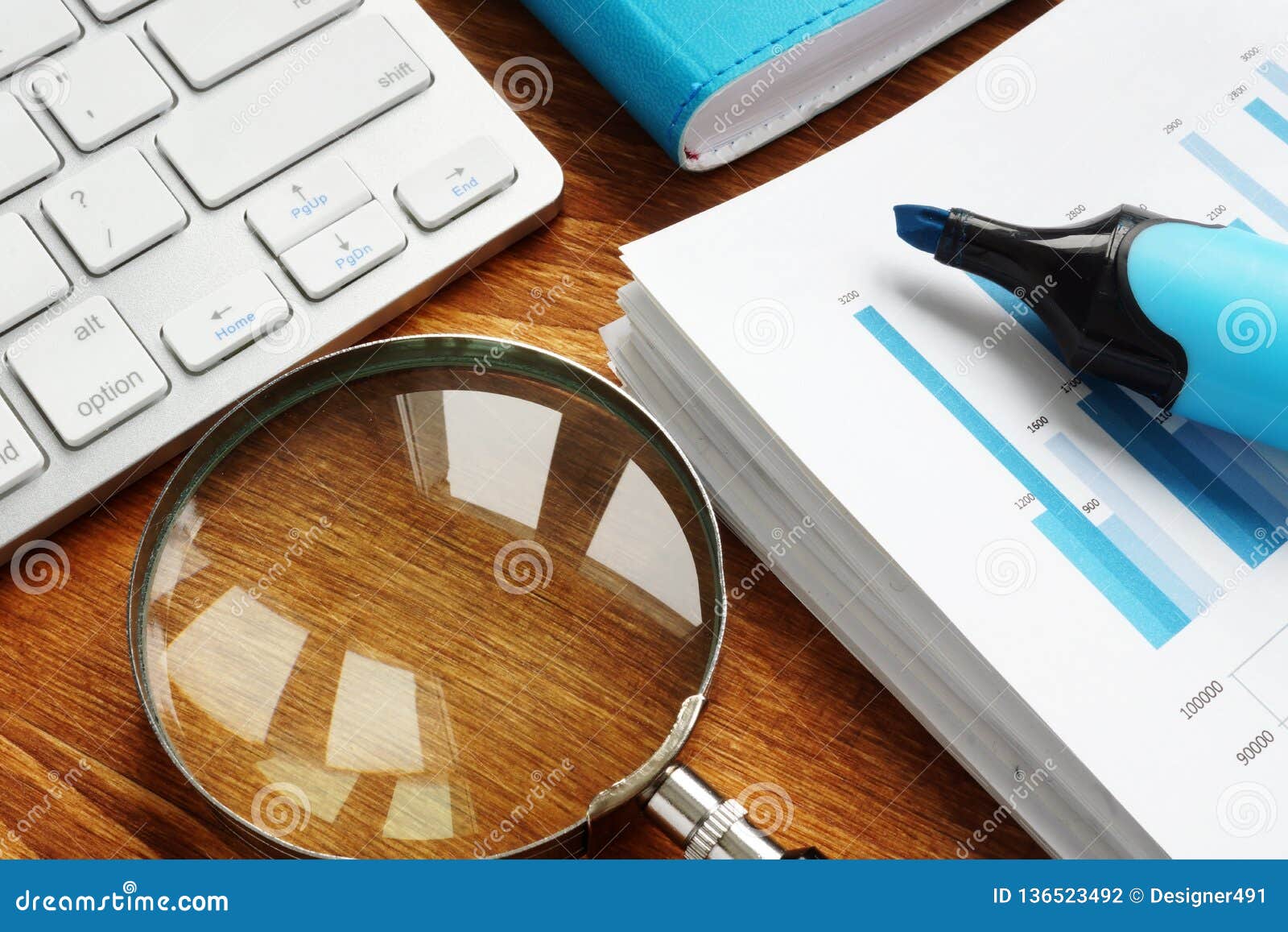Audit and Assessment. Magnifying Glass and Stack of Business Papers ...