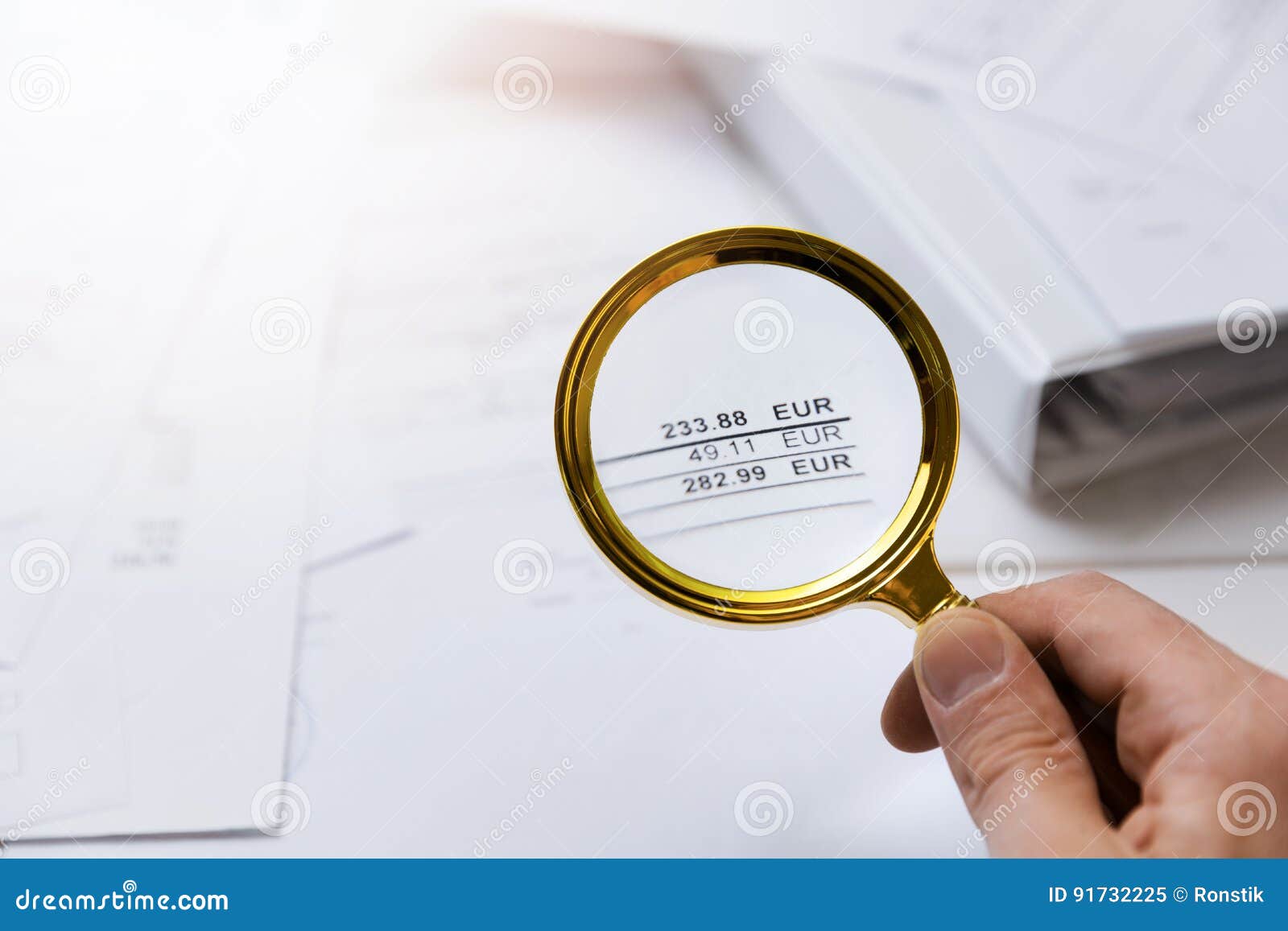 Audit Concept - Auditor Checking Bills with Magnifying Glass Stock ...