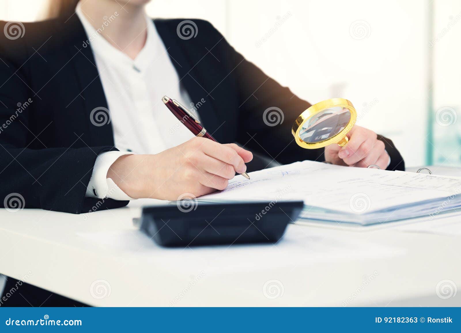 Audit Concept - Auditor with Magnifying Glass Inspecting Stock Image ...