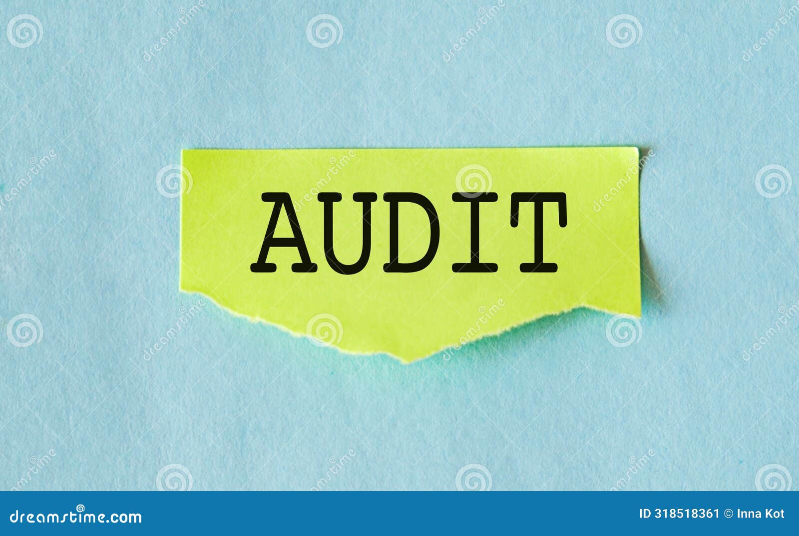 Audit Text on Green Torn Paper on a Blue Background. Stock Image ...