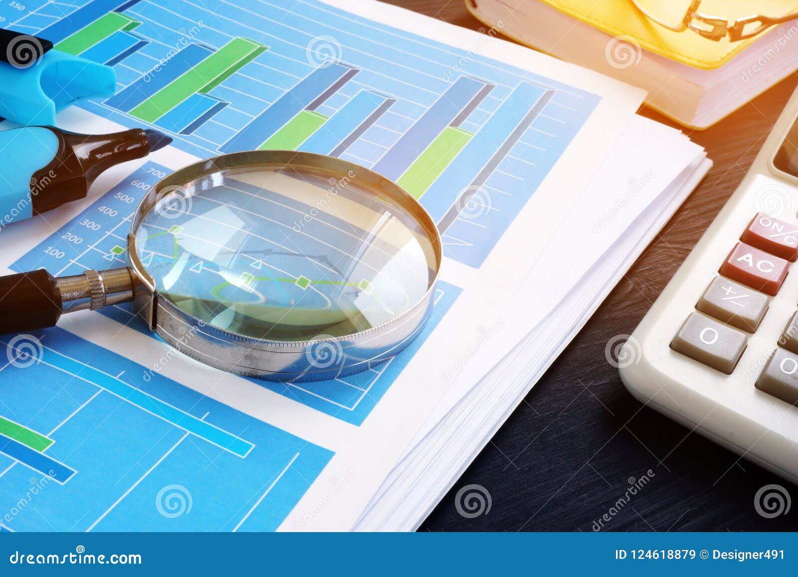 Auditing. Magnifying Glass On Financial Documents With Graphs. Audit ...