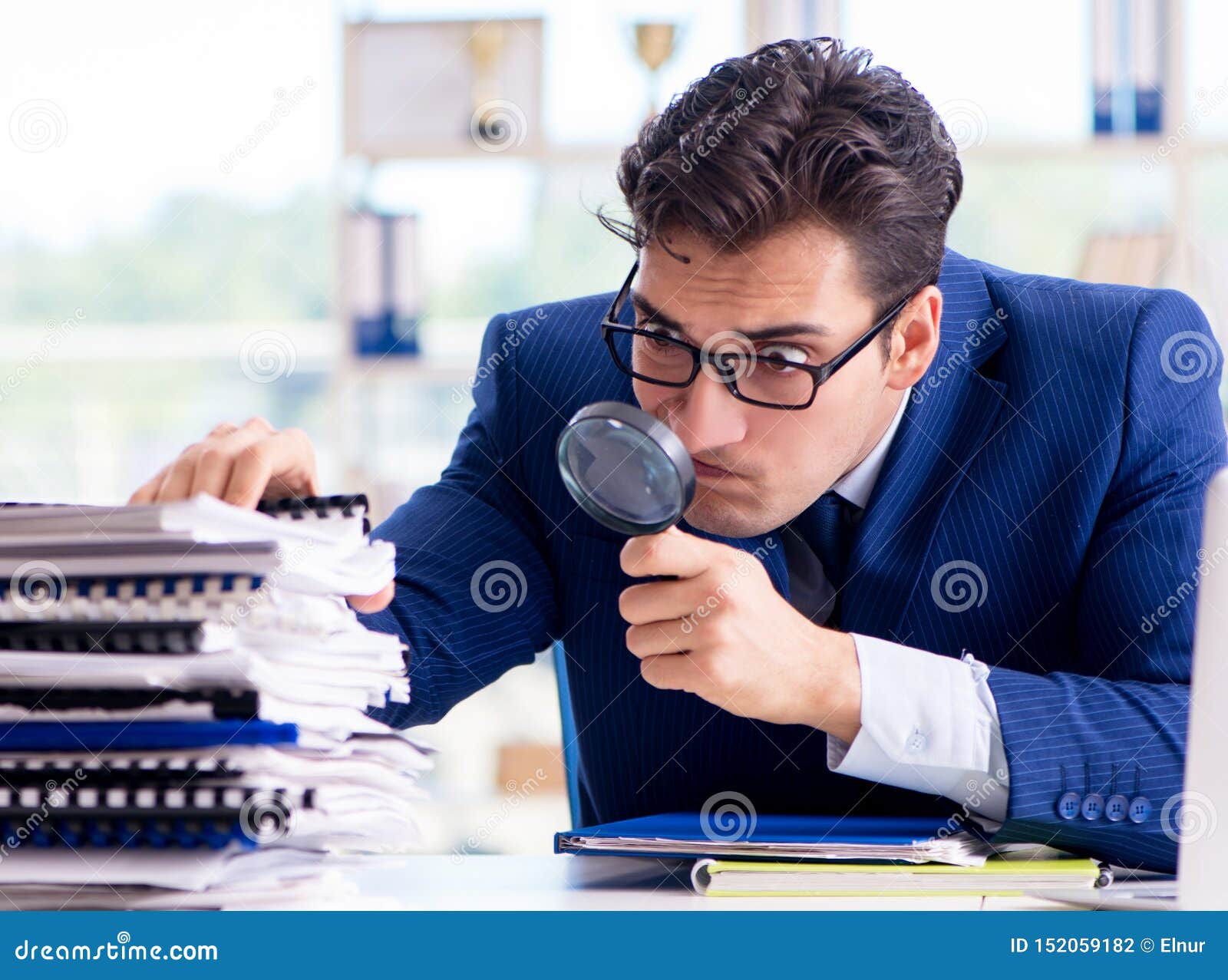 Auditor Looking for Errors in the Financial Statements Stock Photo ...