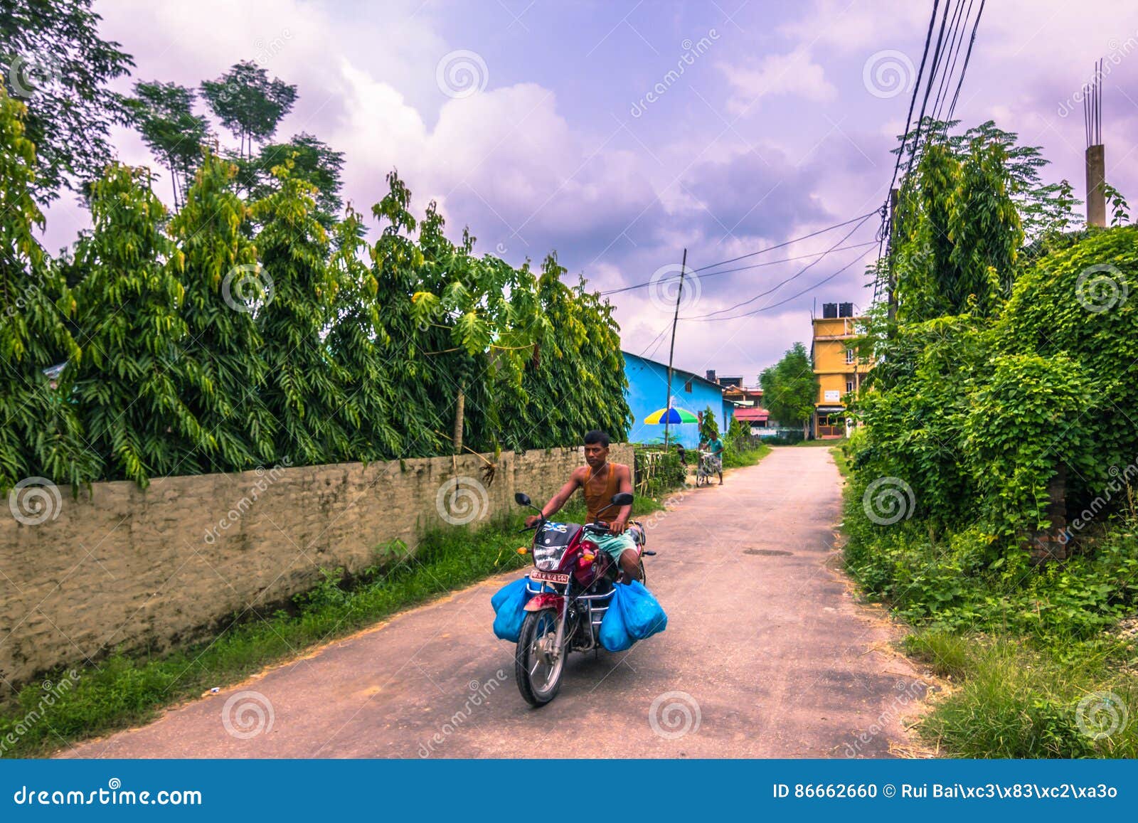 August 25, 2014 - Man Riding a Bike in Sauraha, Nepal Editorial Image ...