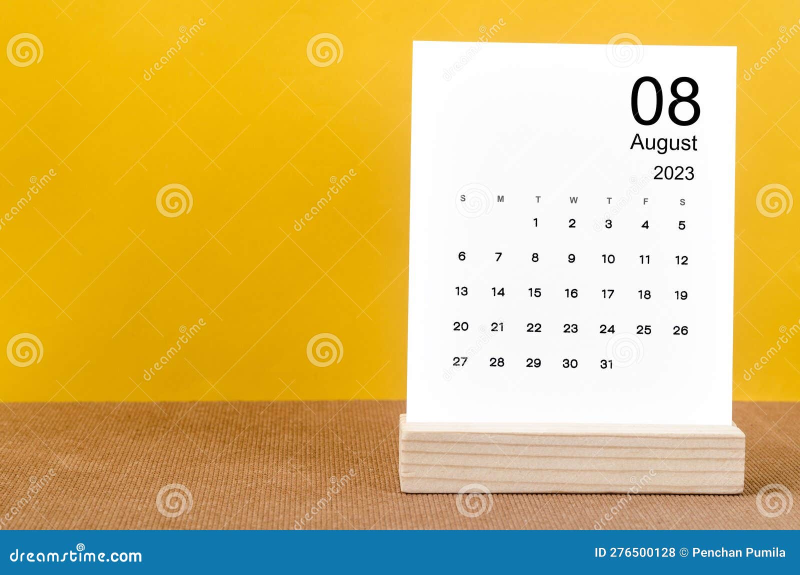 The August 2023 Monthly Calendar for 2023 Year on Yellow Table Stock ...
