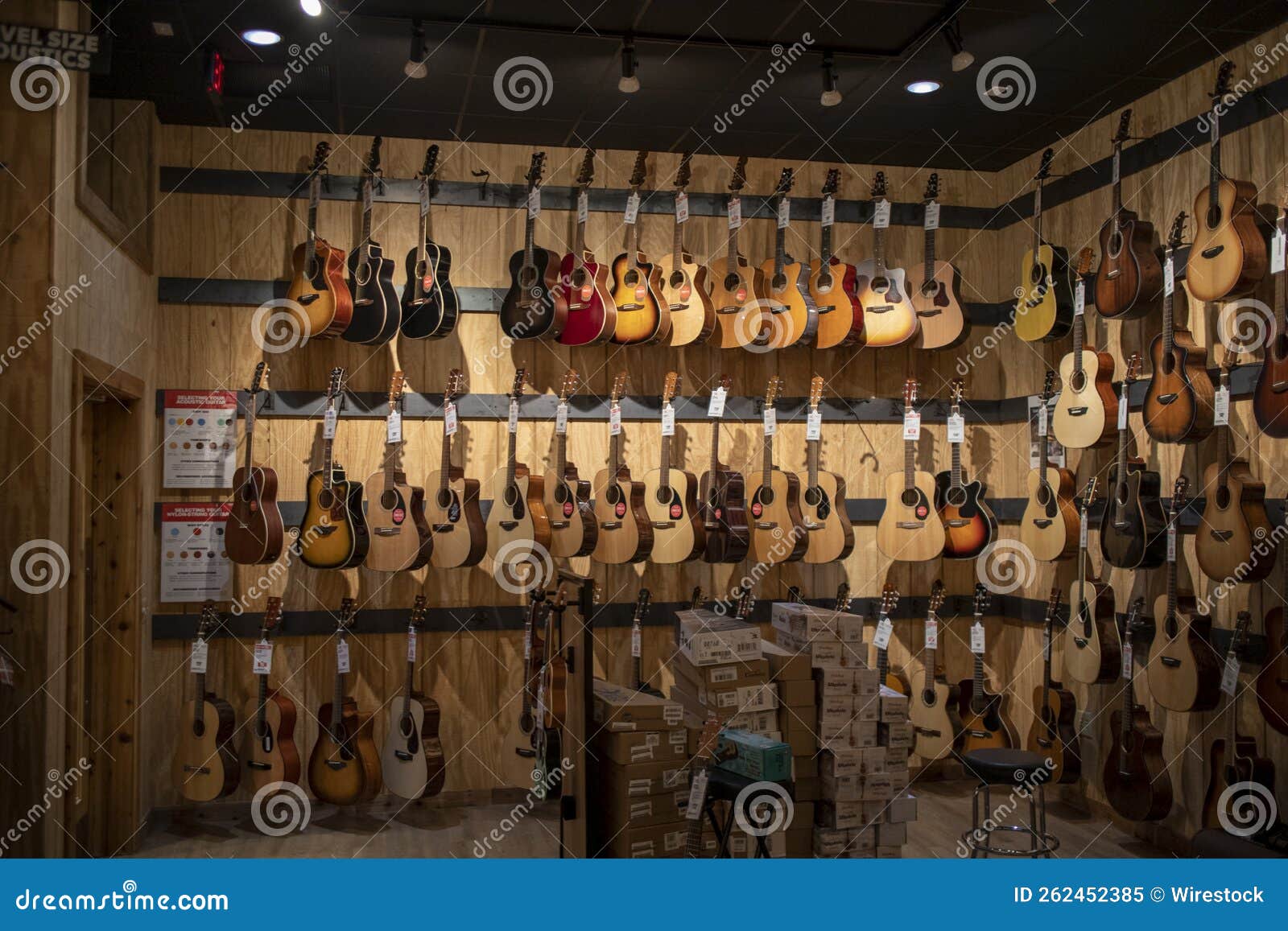 Guitar Center Interior Front View Wall Of Guitars Editorial Image Image Of Guitar Musician