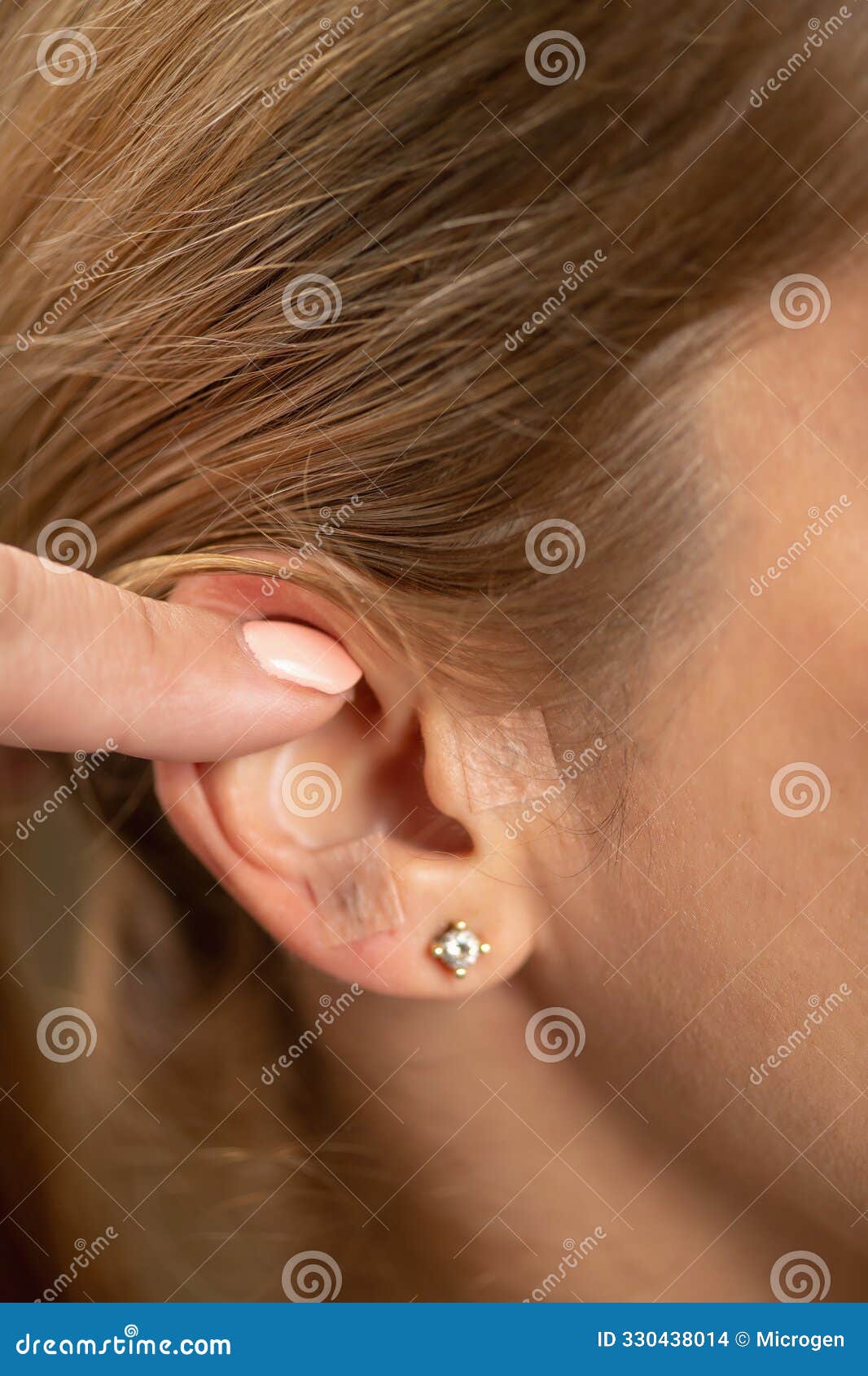 Auriculotherapy Stimulates Pressure Points on the Ear Stock Photo ...