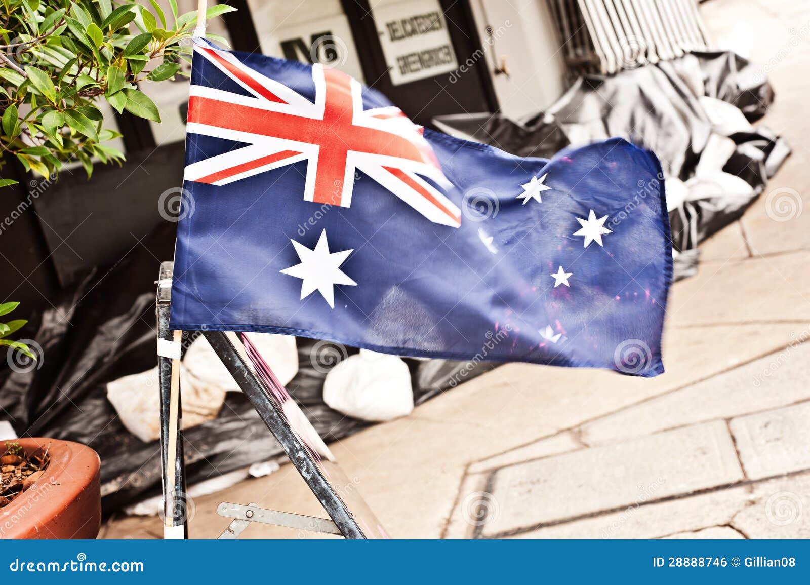 Pile Of Sandbags Next To Warning Exclamation Road Sign And Temporary ...