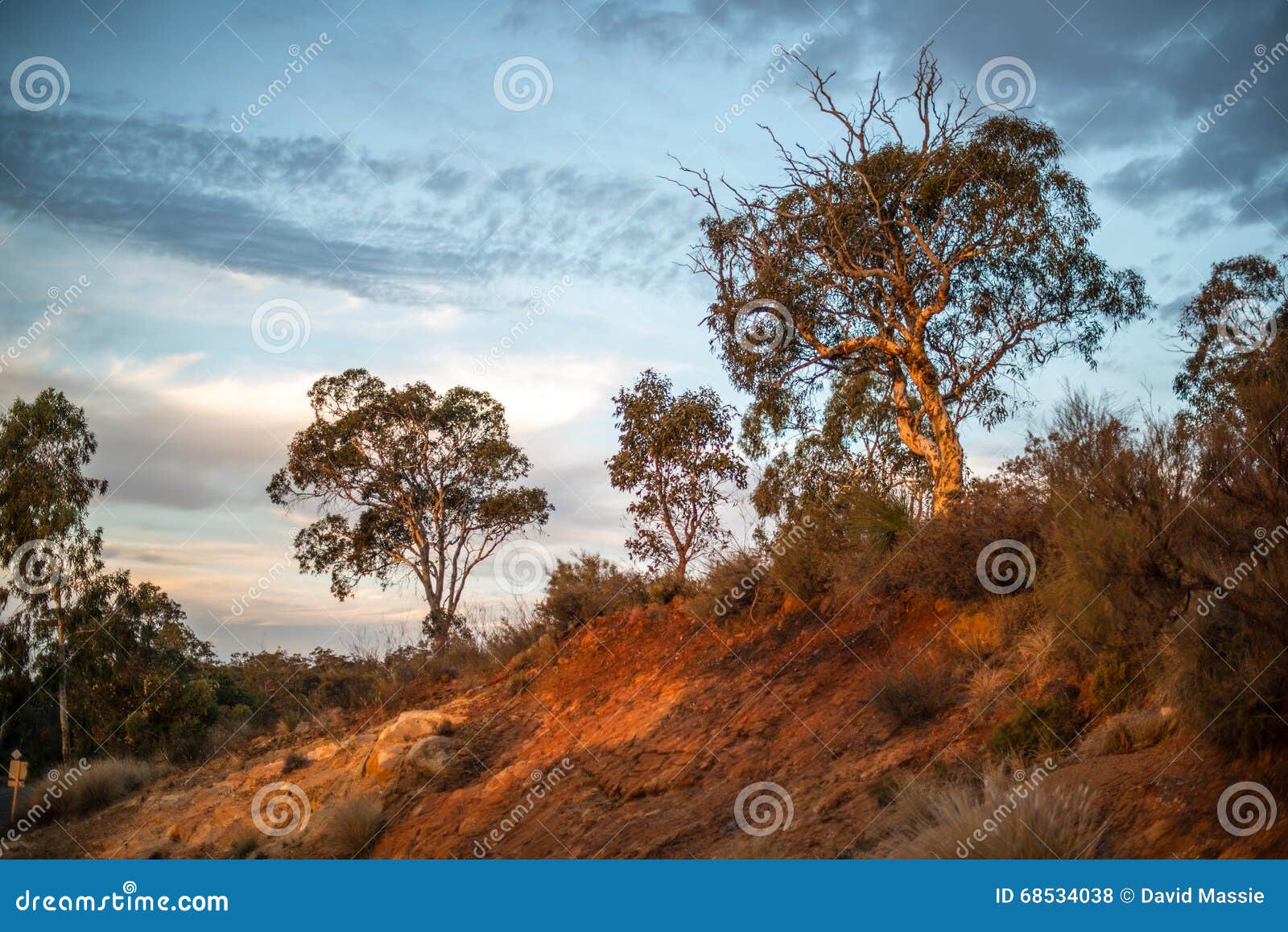 Australian Sunset Over Redhill Stock Photo - Image of rocks, bush: 68534038
