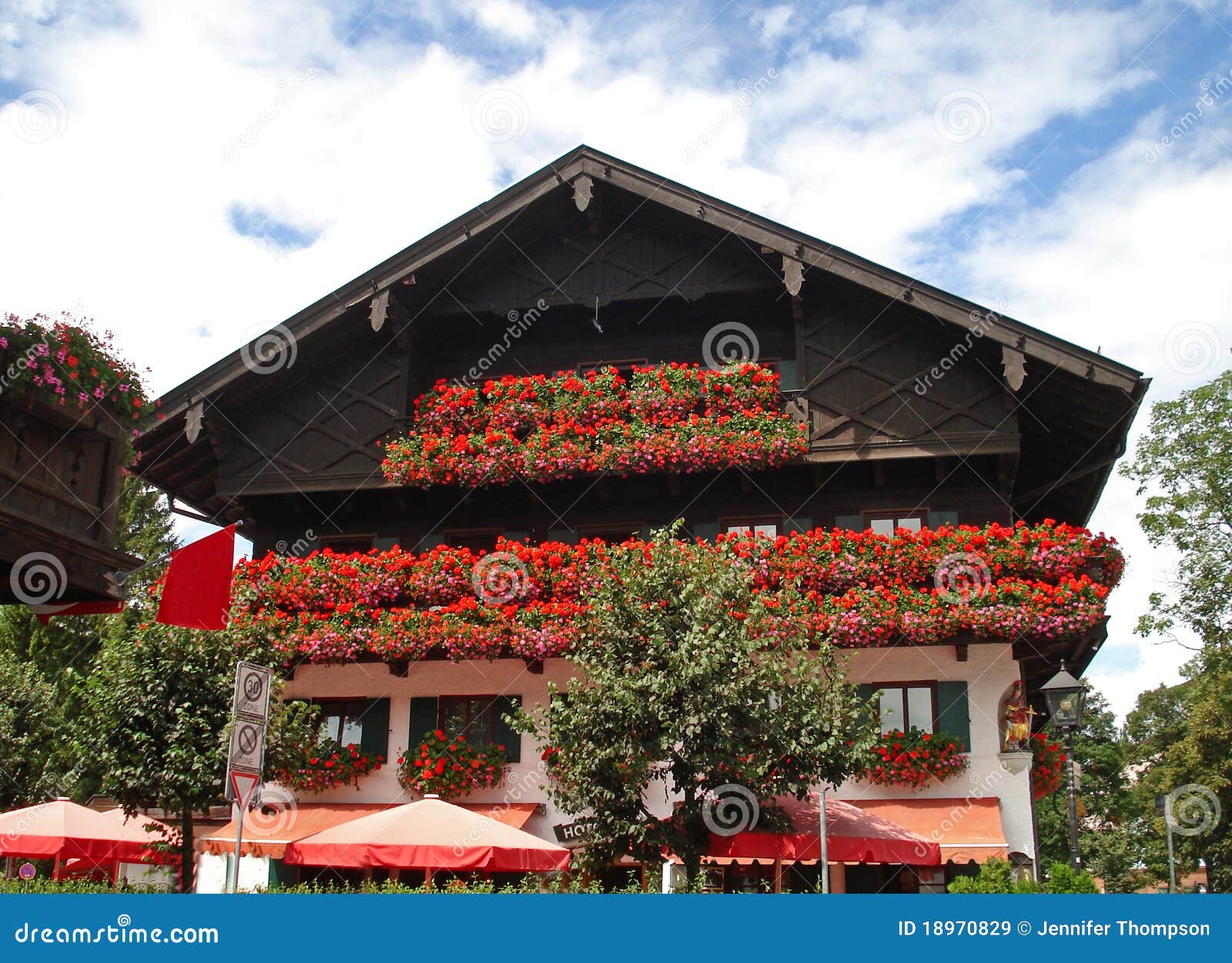 Austrian house stock image. Image of geraniums, pink - 18970829