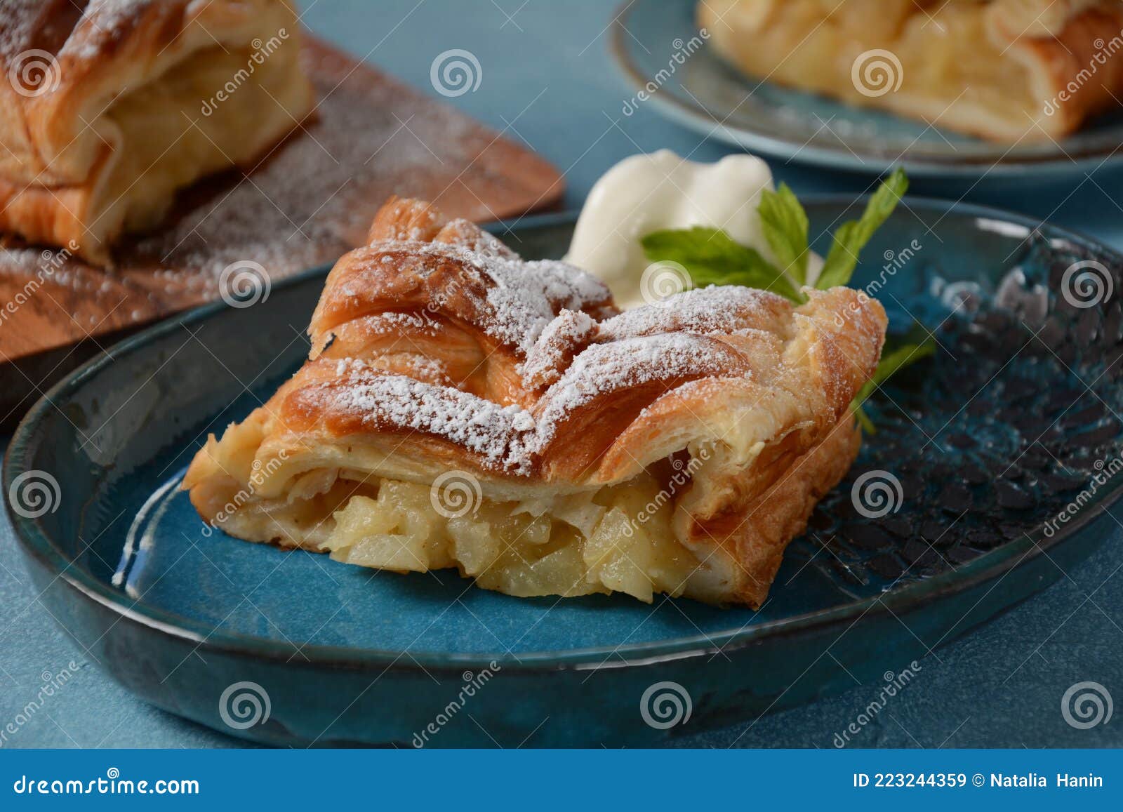 Austrian Strudel with Mint and with Powdered Sugar on a Plate. Stock ...