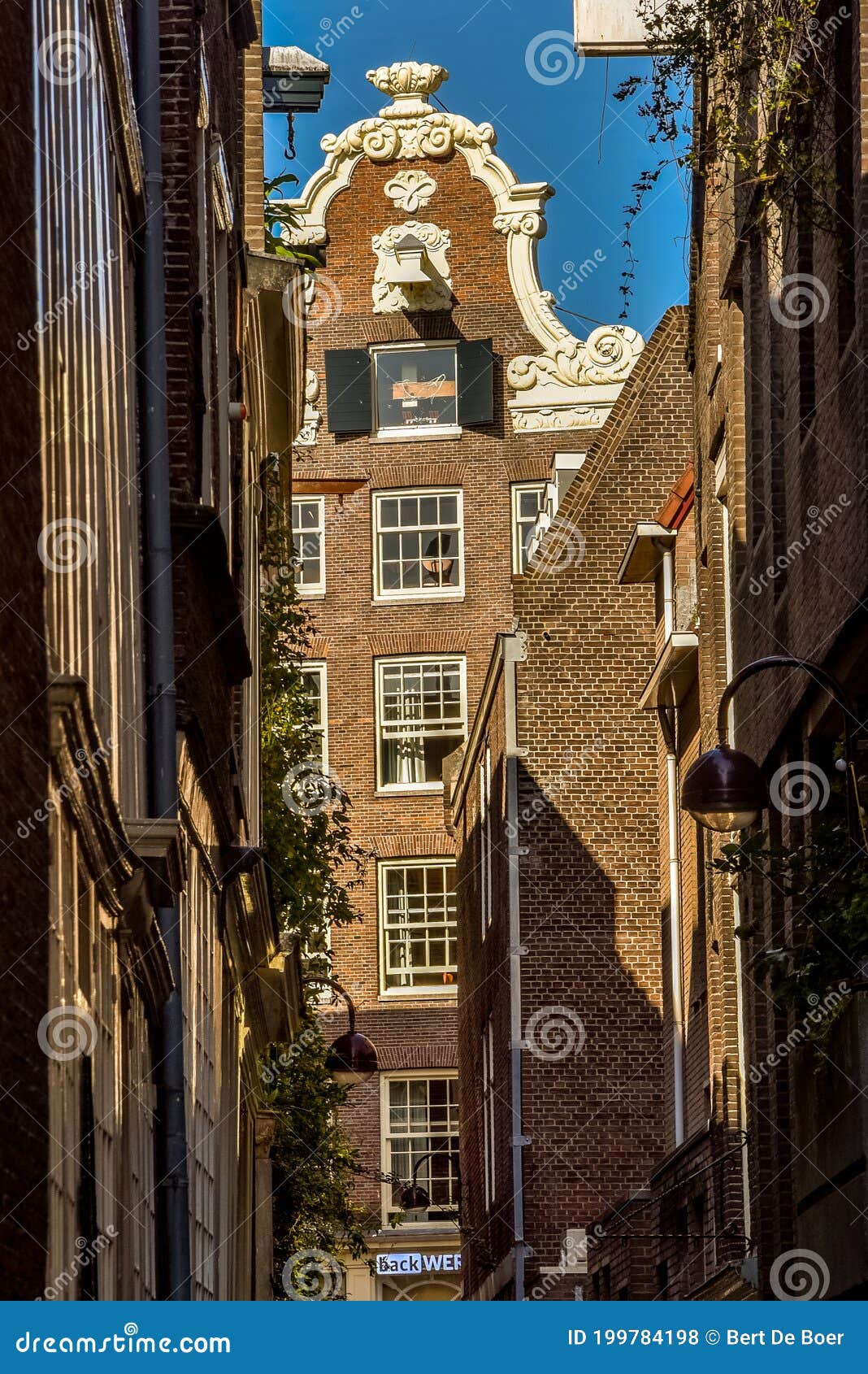 Authentic Clock Gable of a Restored House on the Canals of Amsterdam ...