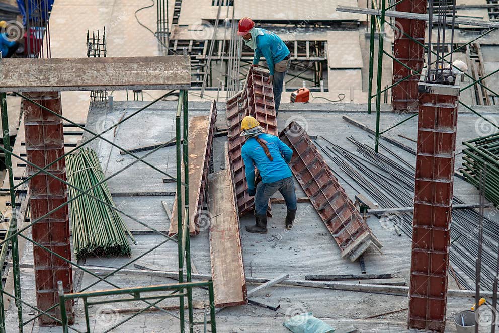 Authentic Construction Worker Busy on the Positioning of Formwork ...