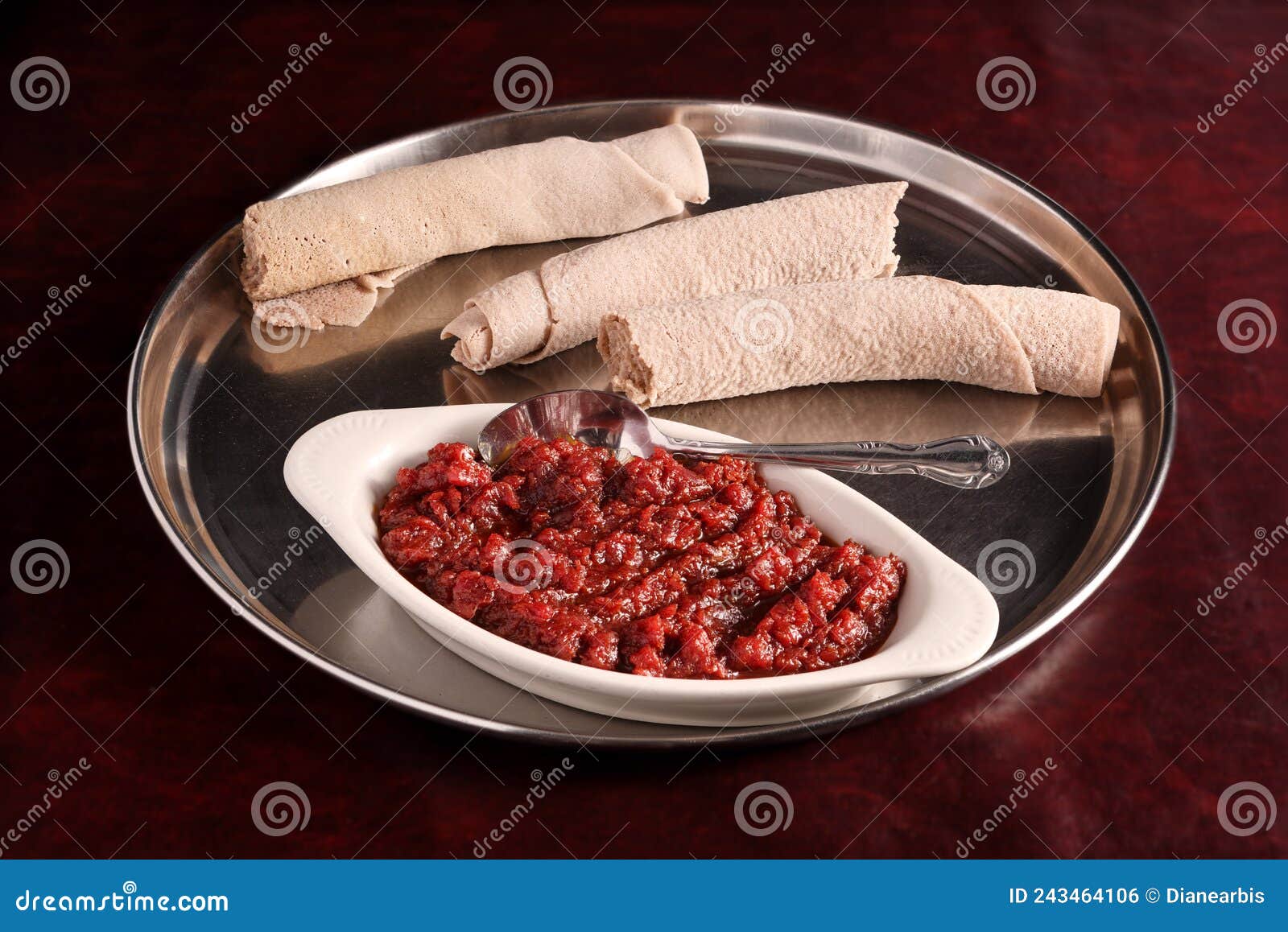 Ethiopian Kitfo with Injera Bread Stock Photo - Image of mitmita ...