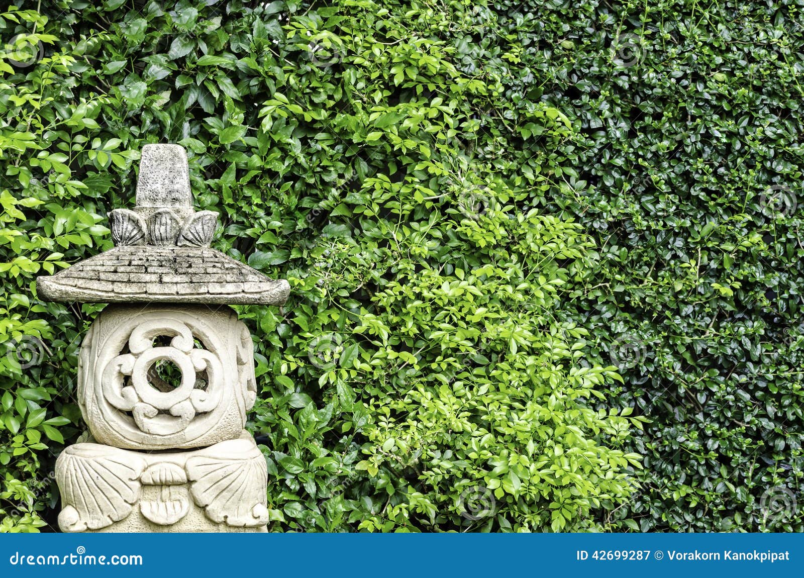 Authentic Handcraft Sandstone Lamp Post in Green Background Stock Image ...