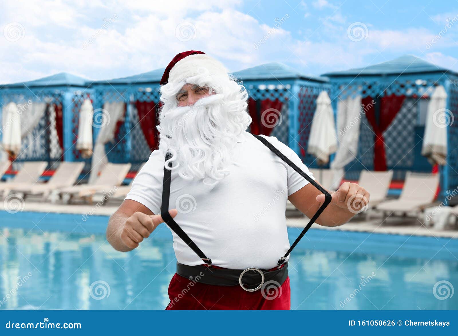 Authentic Santa Claus Having Fun Near Pool Stock Photo - Image of rest ...