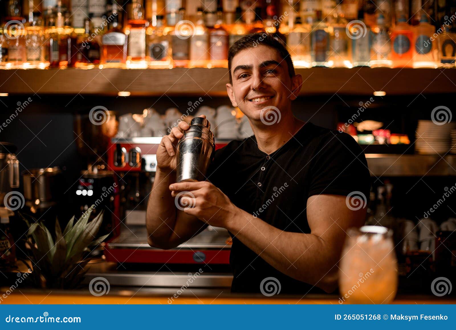 Barman In Bar Interior Making Alcohol Beverage. Professional Bartender ...