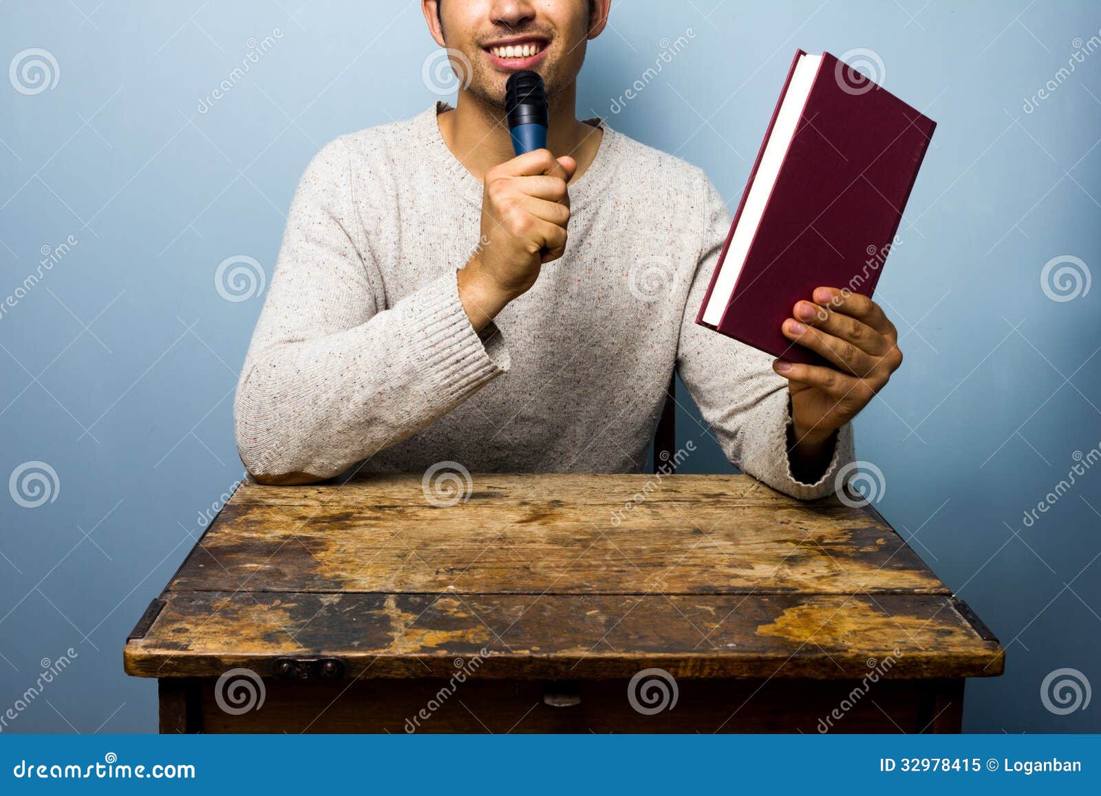 Author Presenting His New Book Stock Image - Image of chatting, desk ...