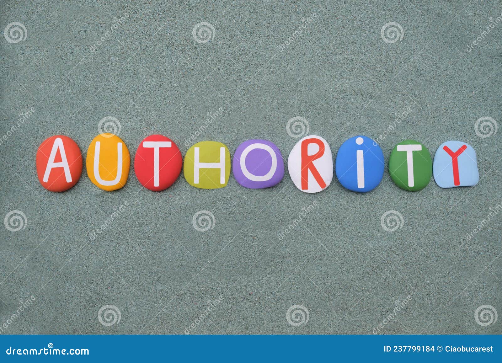 Authority Word Composed with Multi Colored Stone Letters Over Green ...