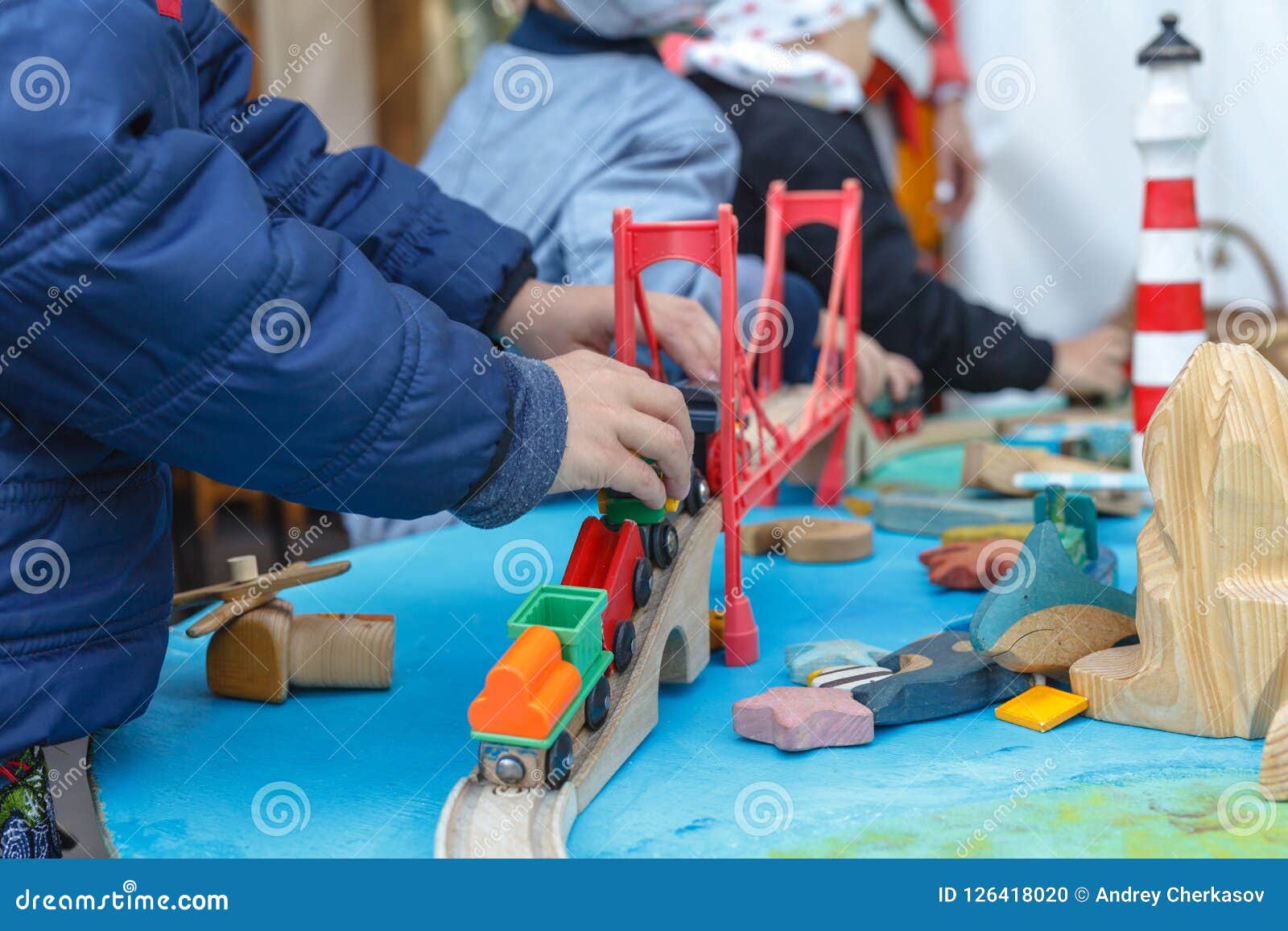 Autistic Boy Playing with Toy Car on Wooden Table Stock Photo - Image ...